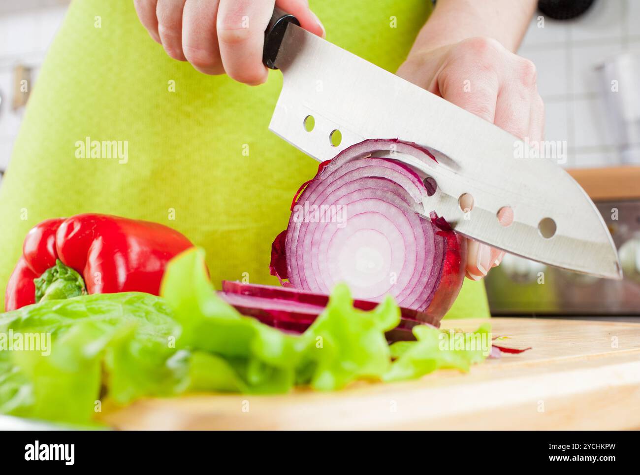 Womans hands cutting bulb hi-res stock photography and images - Alamy