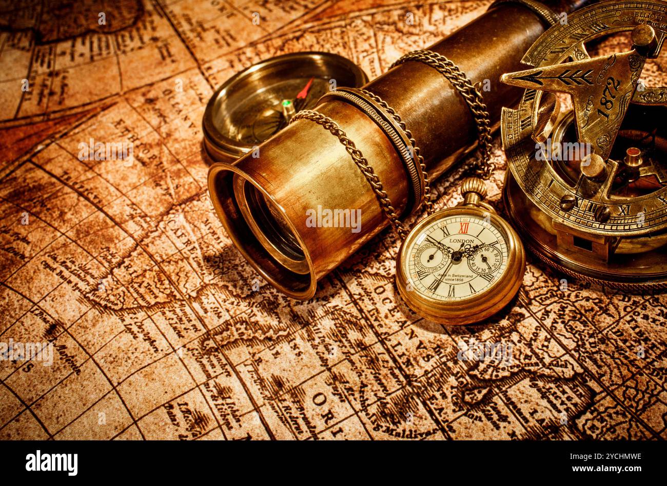 Vintage items on ancient map Stock Photo - Alamy