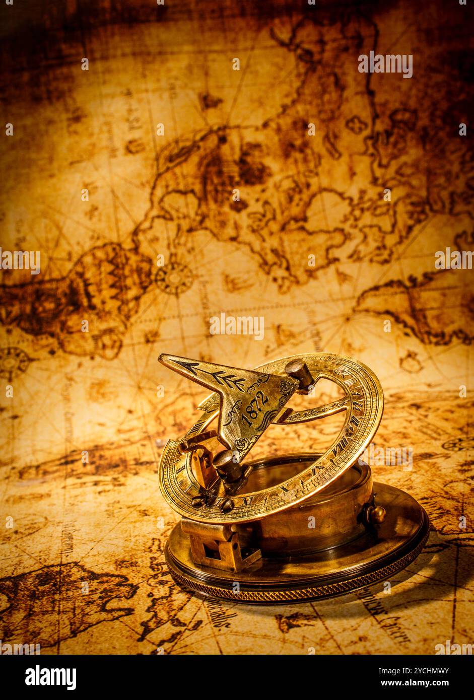 Vintage compass lies on an ancient world map Stock Photo - Alamy