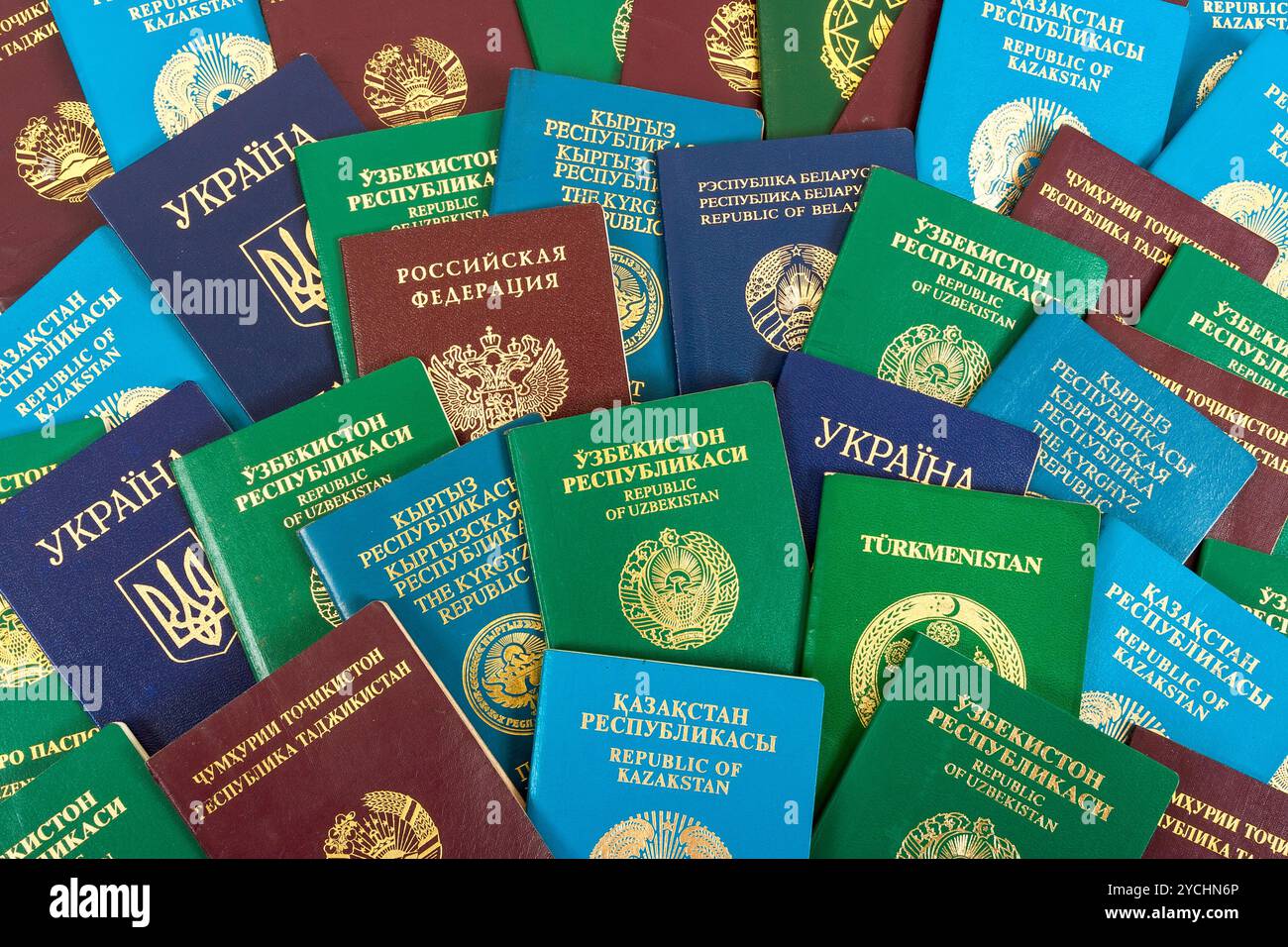 Different foreign passports as background Stock Photo - Alamy