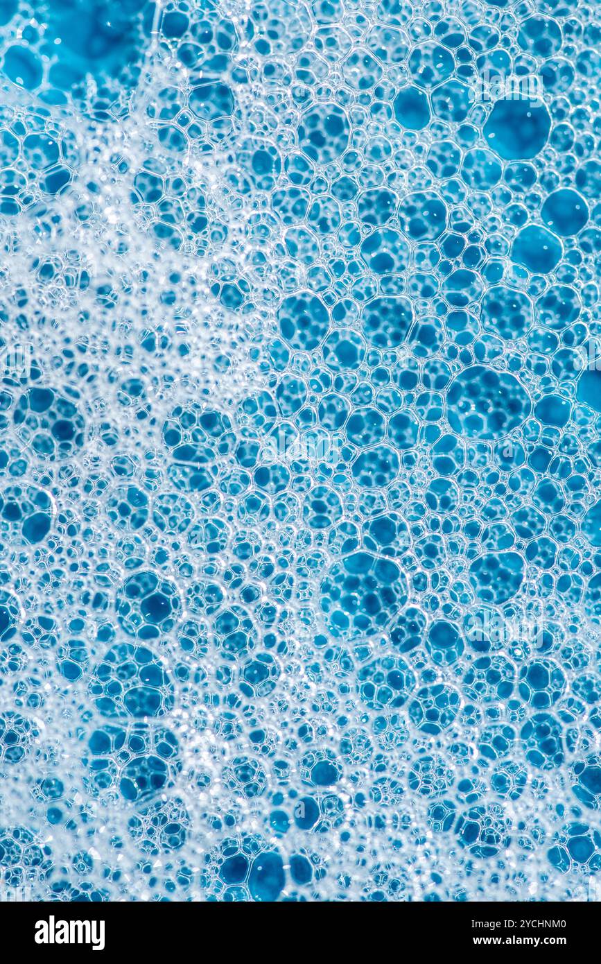 Background and pattern. White soap foam with bubbles, texture on blue ...