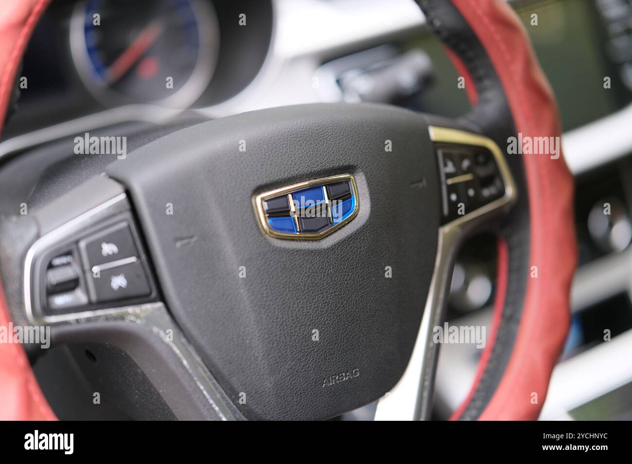 Wuhan,China-Oct.5th 2023:Geely company brand logo on steering wheel ...