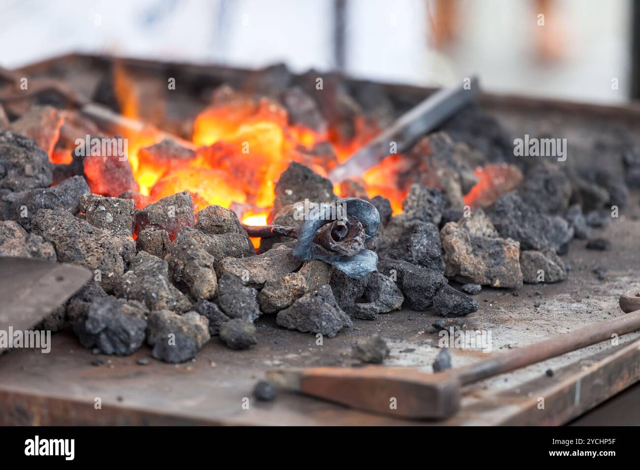Forge fire in blacksmith's where iron tools are crafted Stock Photo - Alamy