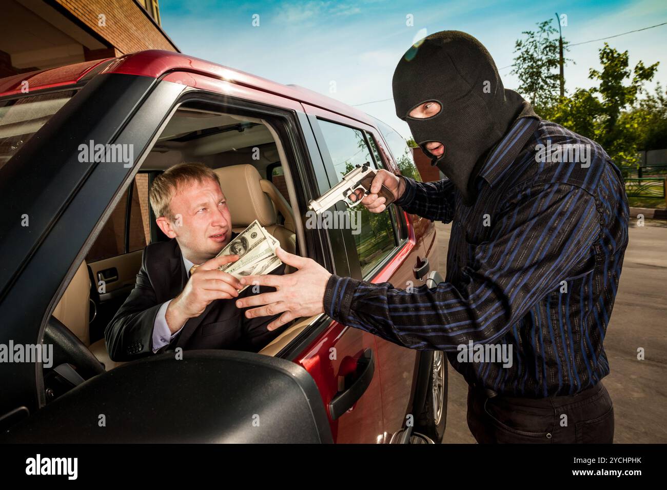 Robbery of the businessman Stock Photo - Alamy