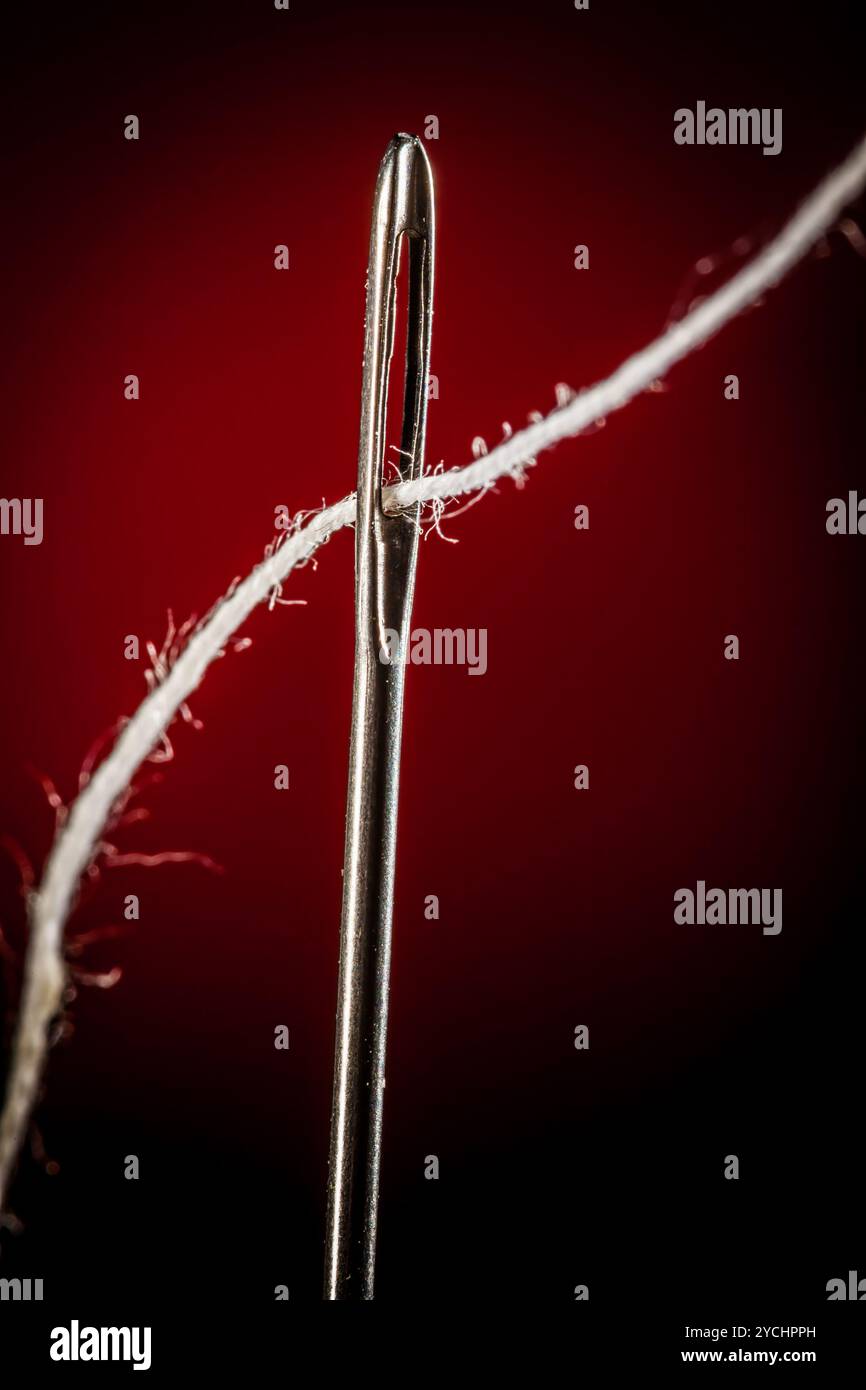 Small hole needle thread hi-res stock photography and images - Alamy