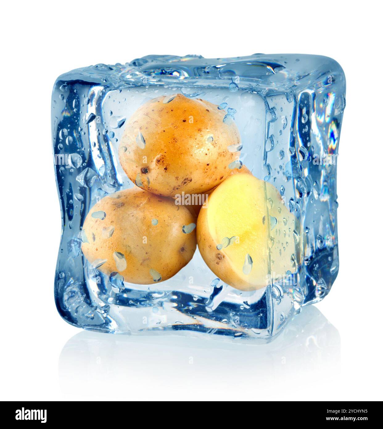Ice cube and potato Stock Photo - Alamy