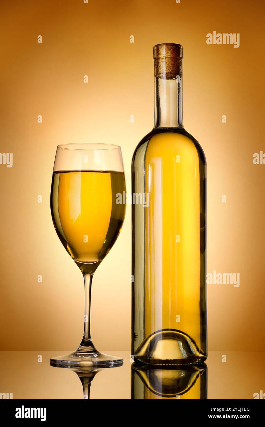 Bottle over gold background Stock Photo - Alamy