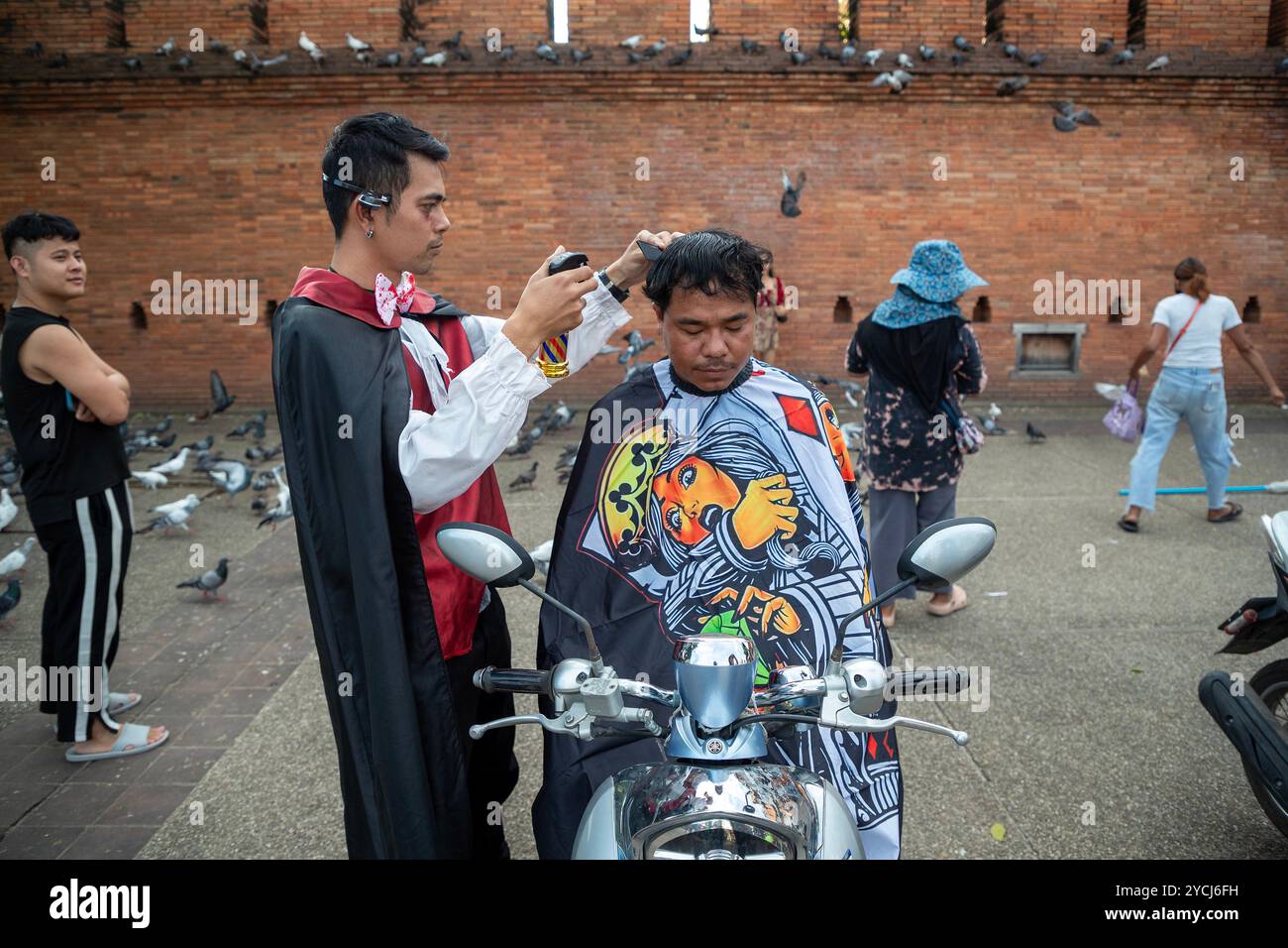 A barber dressed as Count Dracula is offering free haircuts to celebrate Halloween and promote ...