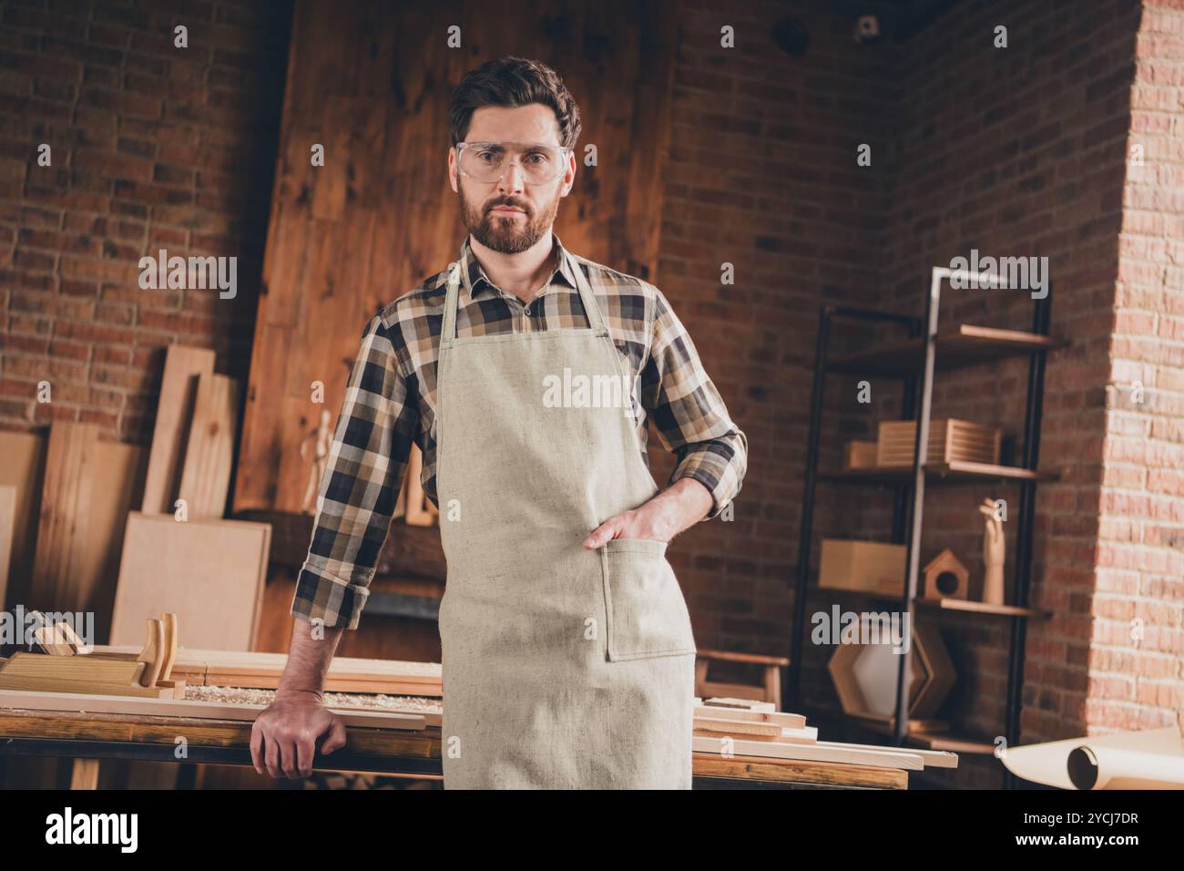 Serious handyman in protective hi-res stock photography and images - Alamy