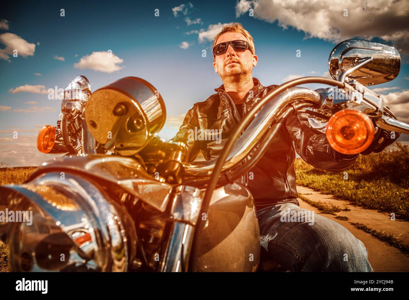 Biker on a motorcycle Stock Photo - Alamy