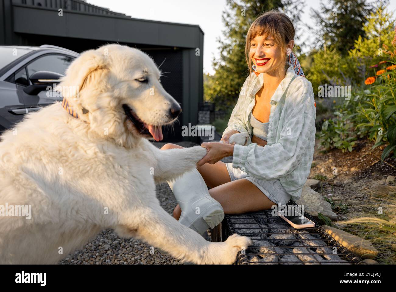 Joyful Bond with a Furry Friend Stock Photo - Alamy