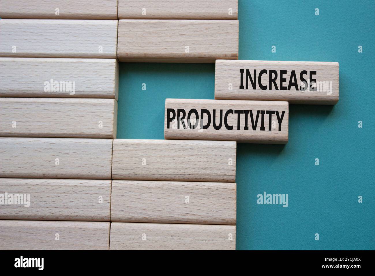 Increase Productivity symbol. Wooden blocks with words Increase ...