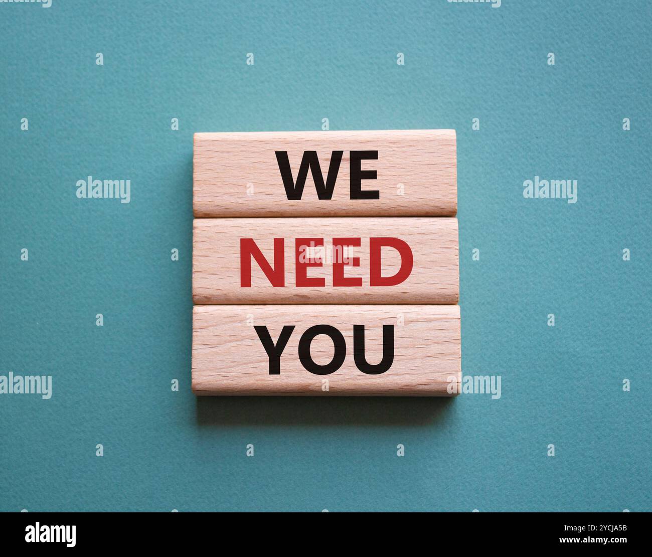 We need you symbol. Concept words We need you on wooden blocks ...