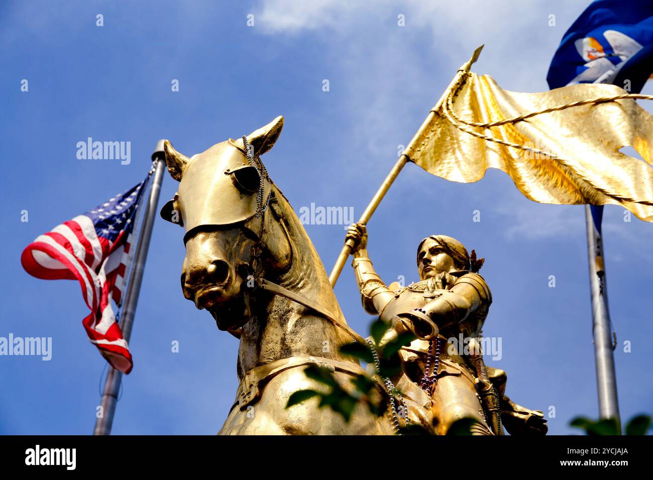 Joan of arc statue in new orleans holding flag hi-res stock photography ...