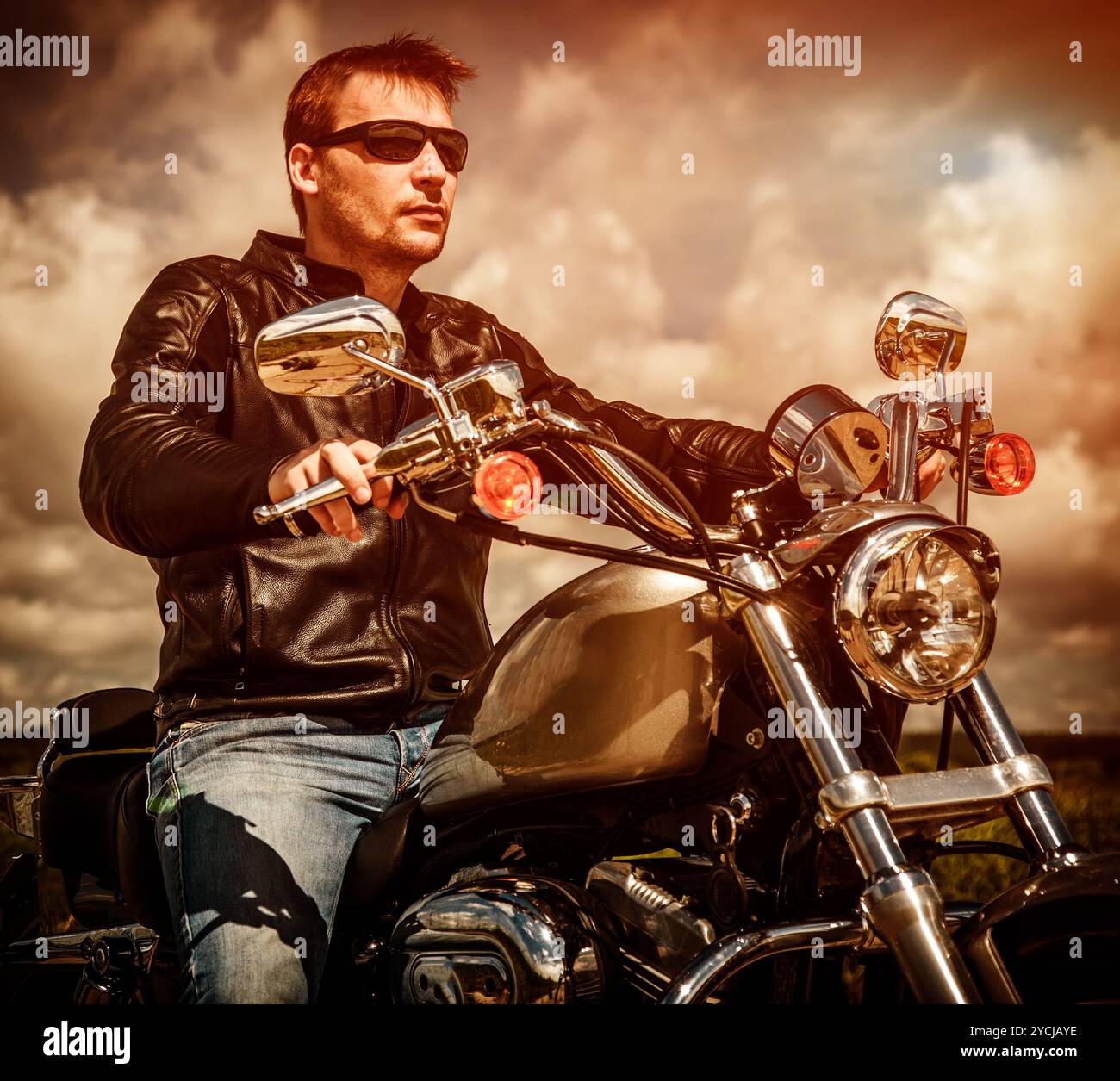 Biker on a motorcycle Stock Photo - Alamy
