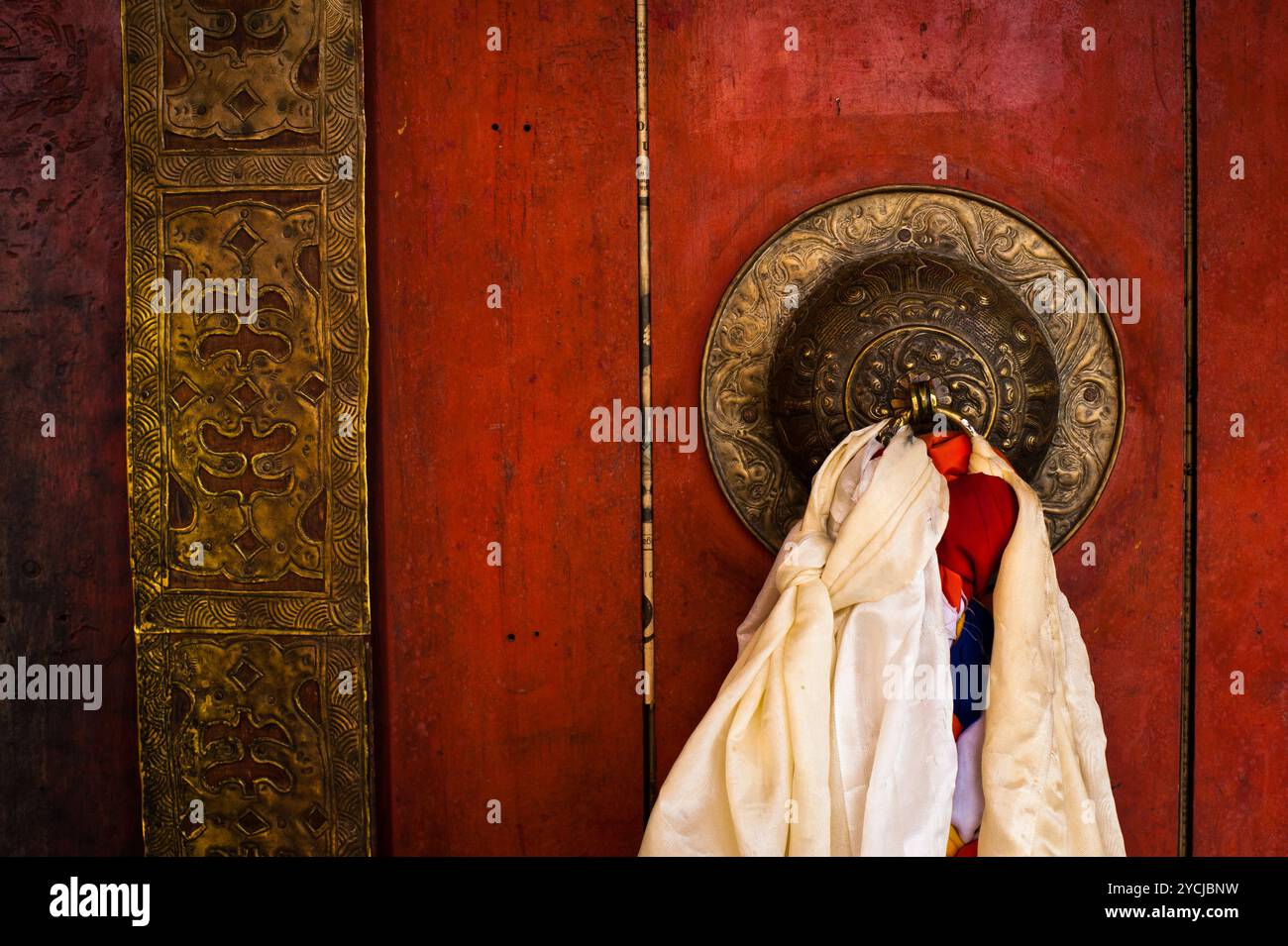Old door at Buddhist monastery temple decorated with ancient doorknob ...