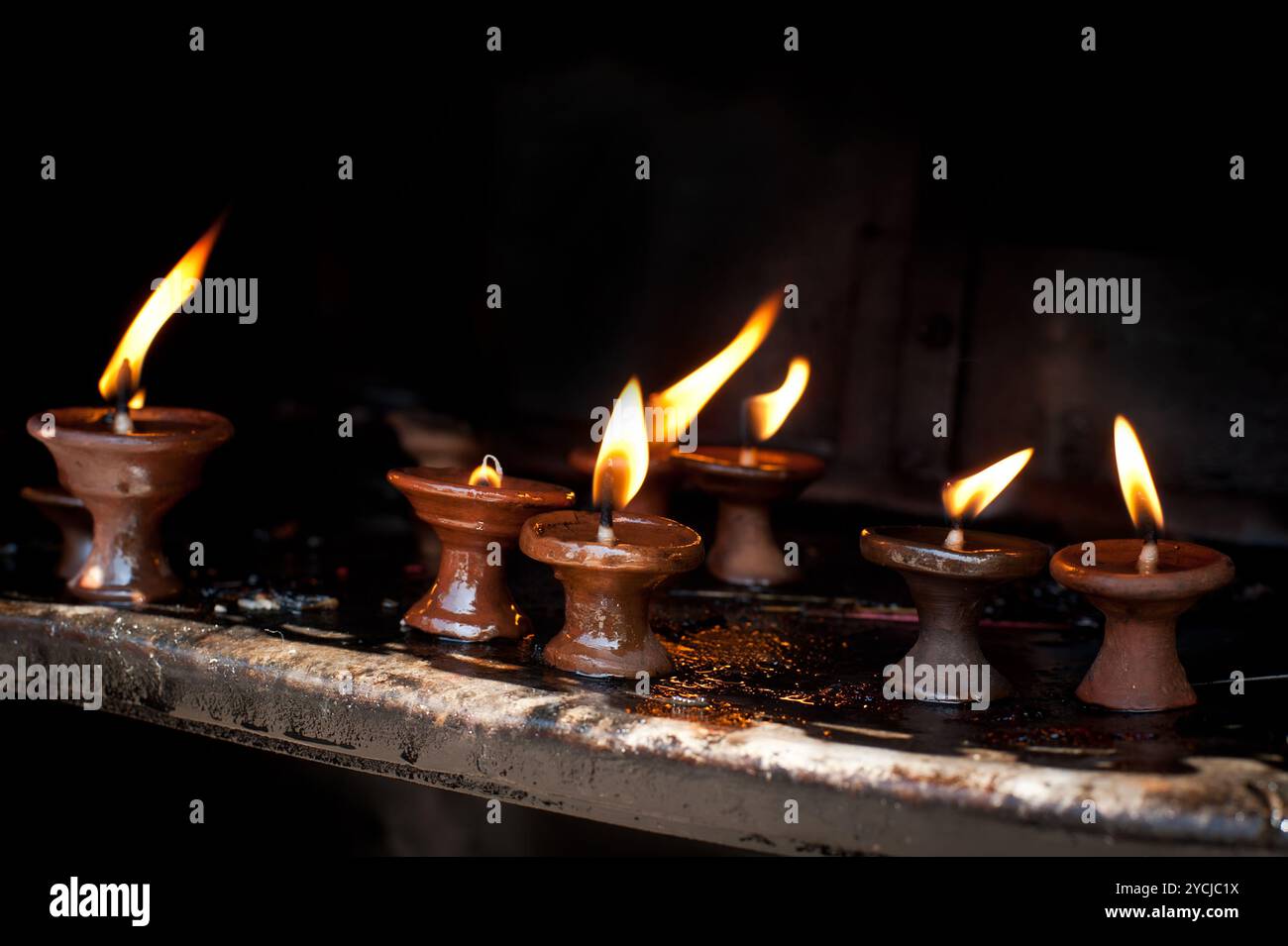 Buddhist oil lamps hi-res stock photography and images - Alamy