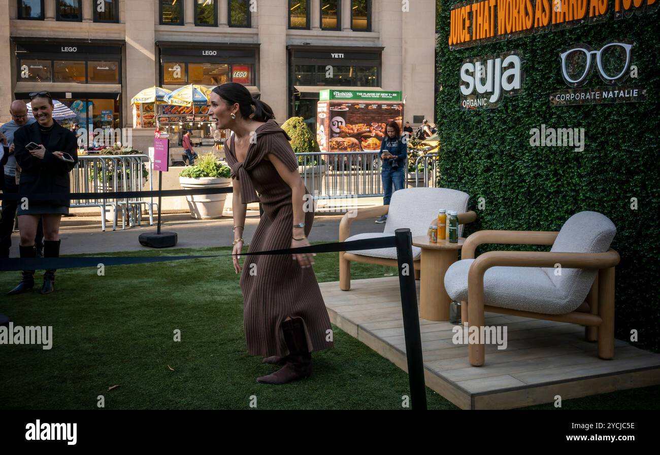 Visitors to Flatiron Plaza in New York on Tuesday, October 22, 2024 ...