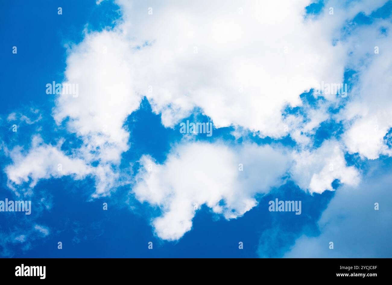 Blue sky with white cloud closeup Stock Photo - Alamy