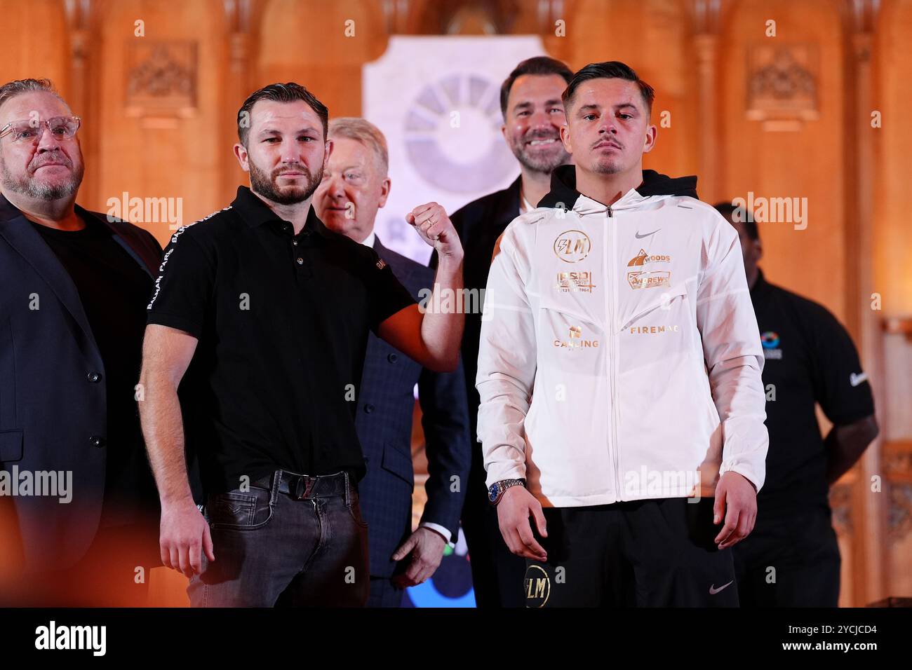 Isaac Lowe (left) and Lee McGregor pose for photos during a press ...