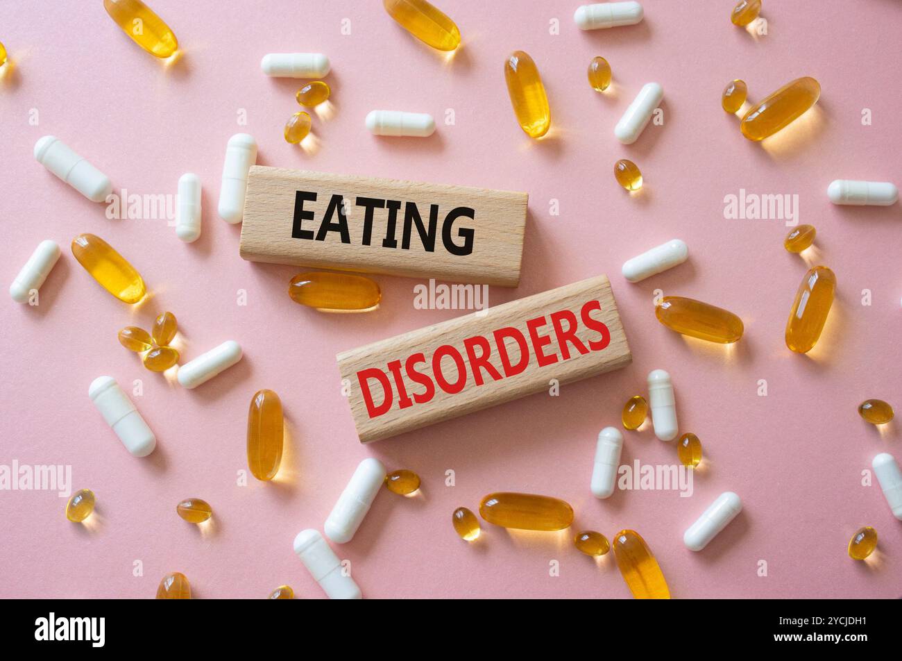 Eating Disorders symbol. Concept word. Eating Disorders on wooden ...