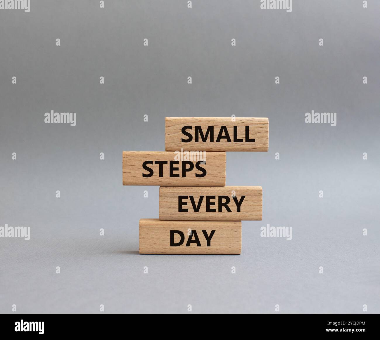 Small Steps Every Day symbol. Wooden blocks with words Small Steps ...