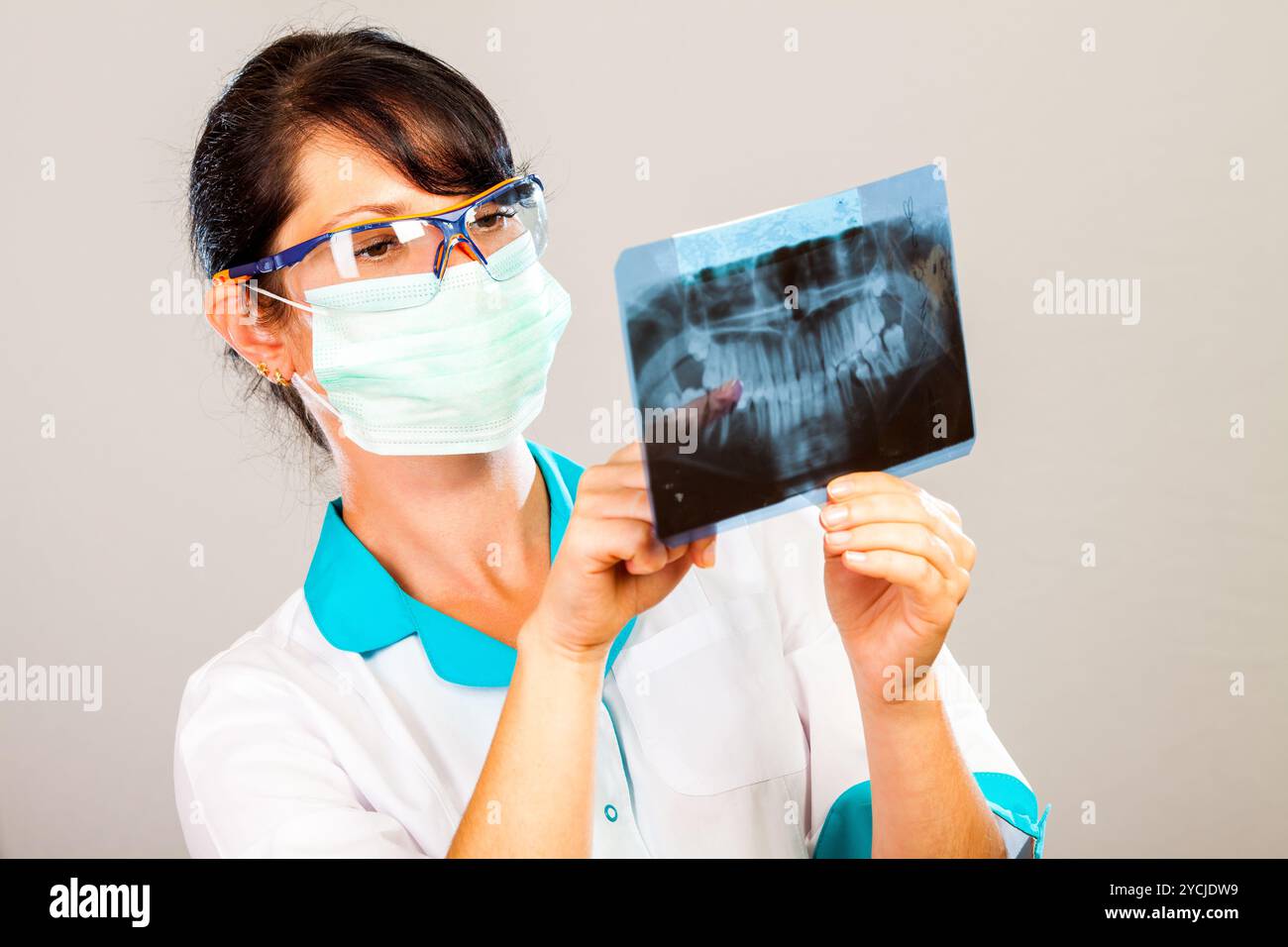 Dentist with xray Stock Photo - Alamy