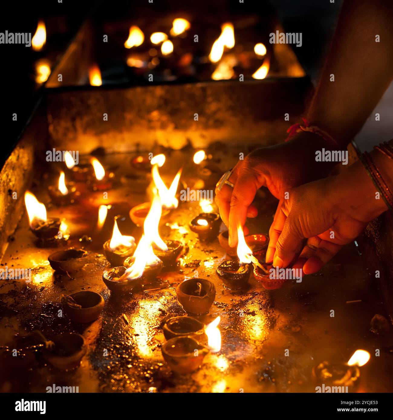 India temple lamps hi-res stock photography and images - Alamy