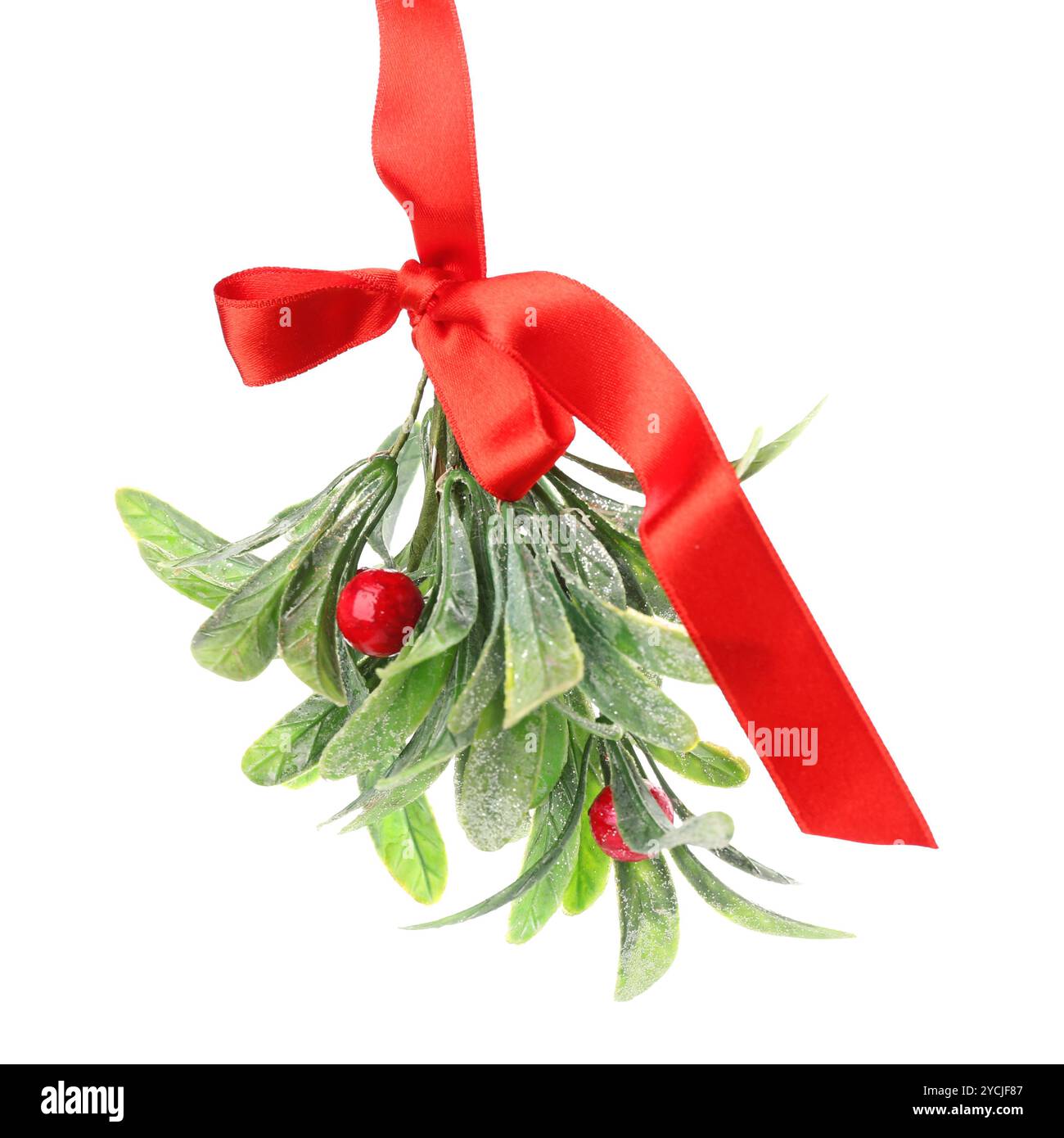 Mistletoe branch with bow on white background Stock Photo - Alamy