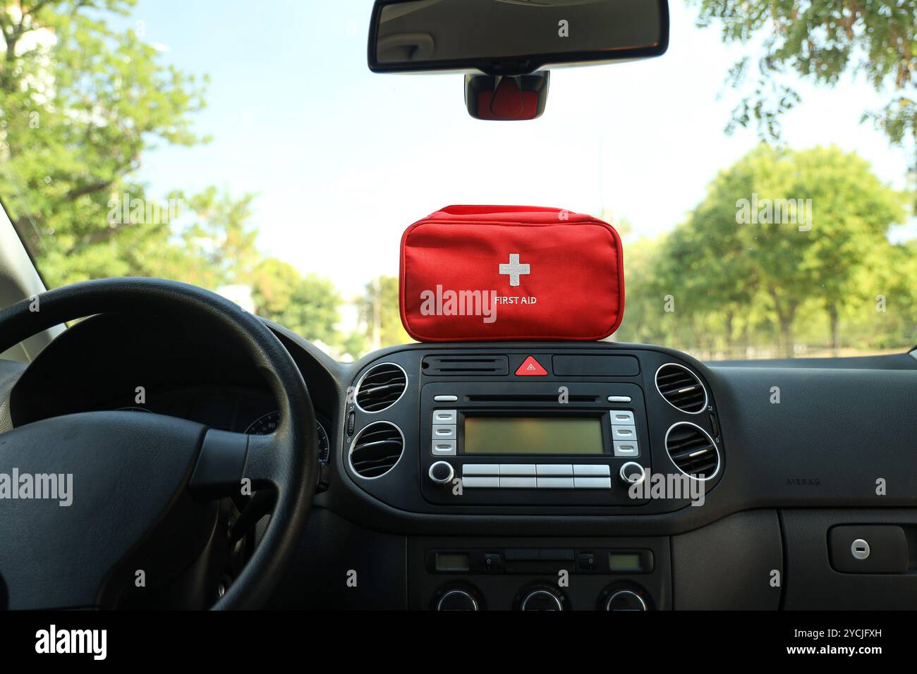 First aid kit on car dashboard Stock Photo - Alamy