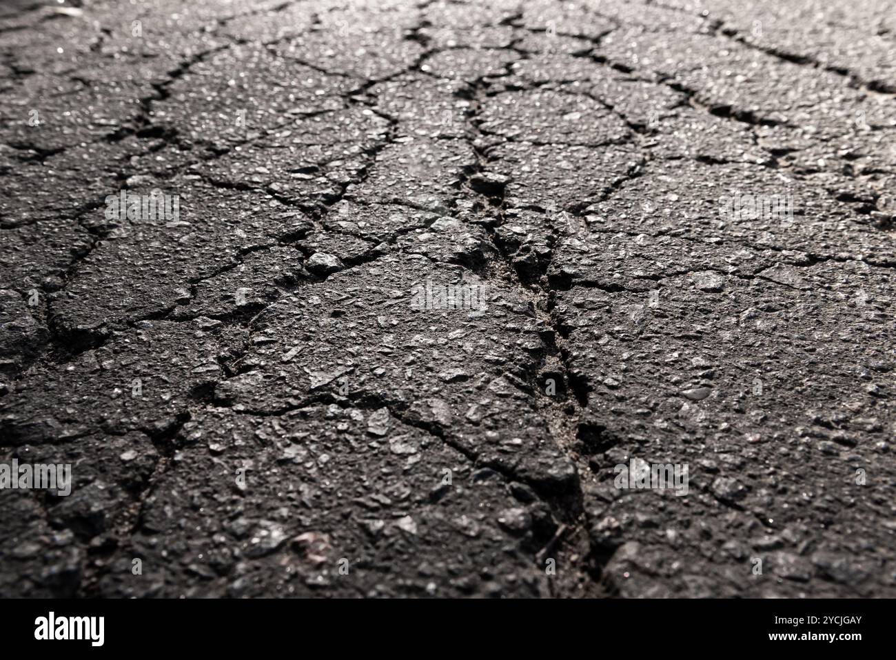 Cracked asphalt texture. Top view. Asphalt. Road background Stock Photo ...