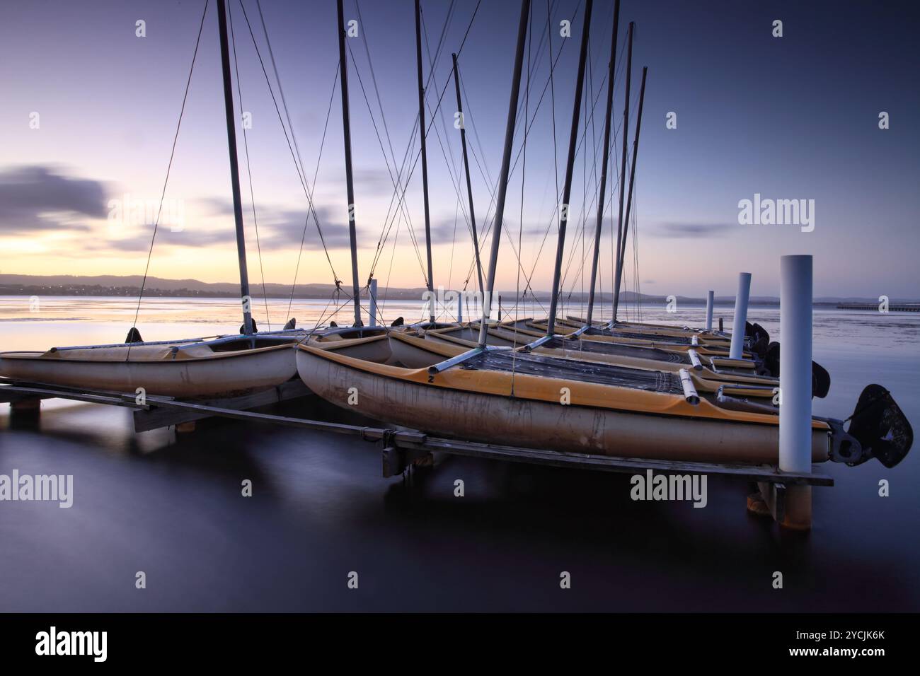 Catamarans moored at Long Jetty, Australia Stock Photo - Alamy