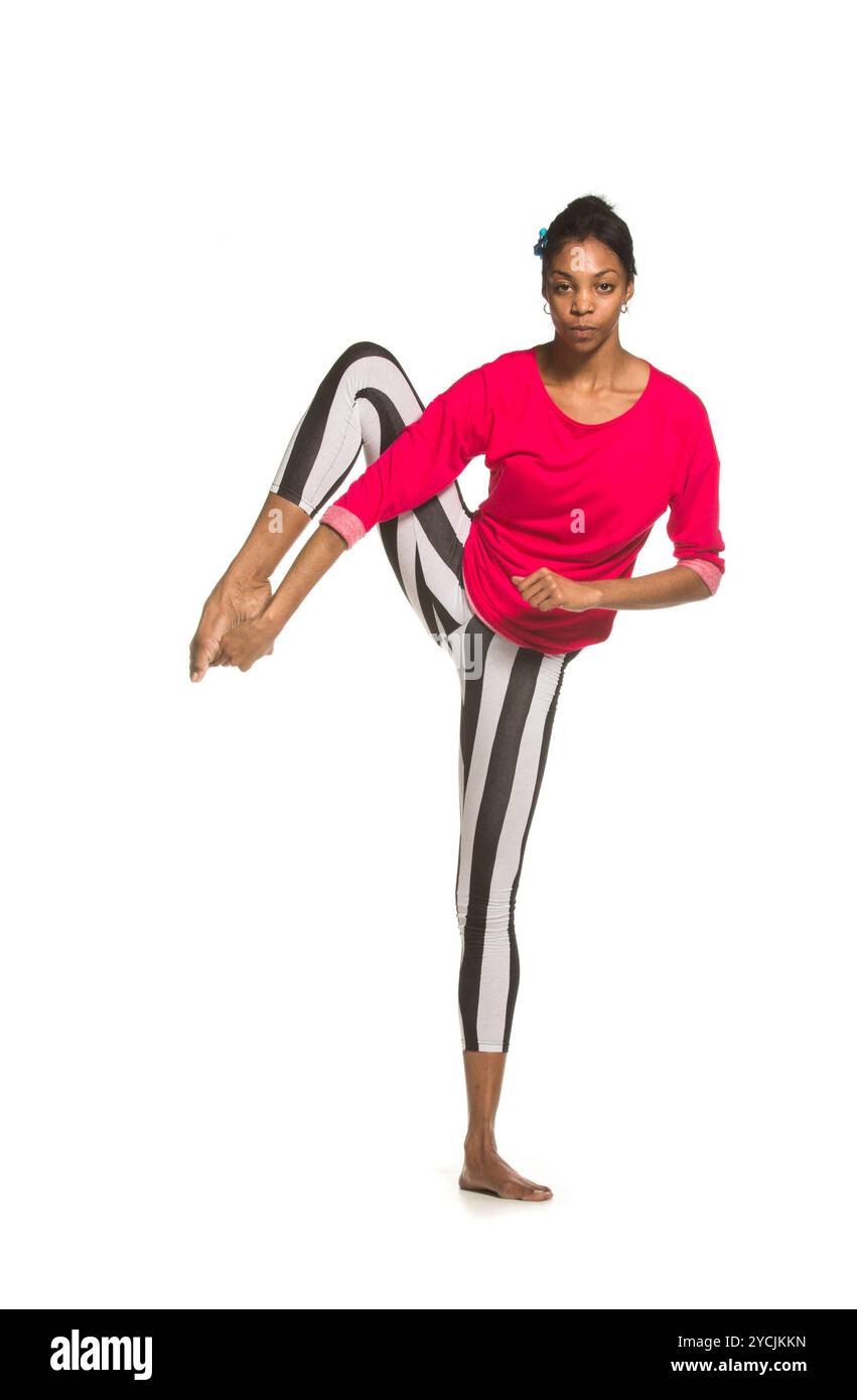 Vertical splits. Latina dancer girl, isolated Stock Photo - Alamy
