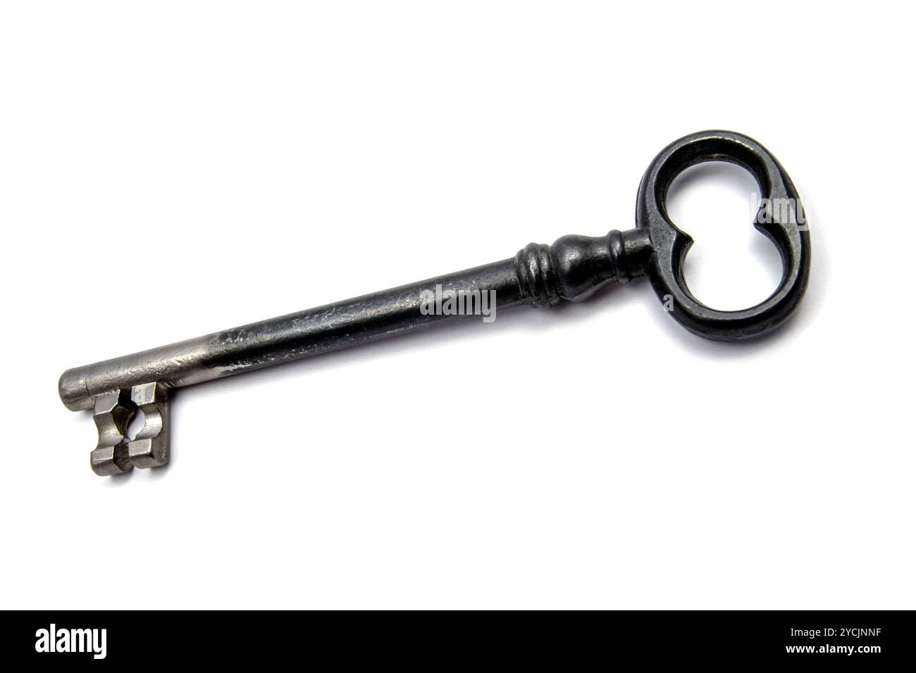 Old key isolated on white background Stock Photo - Alamy