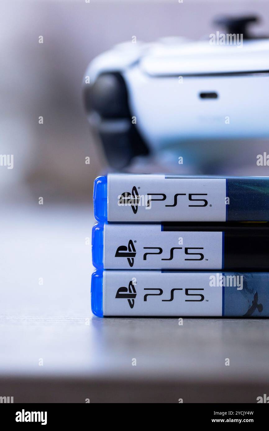 Brecht, Belgium - 3 october 2024: a vertical closeup of a Playstation 5 ...