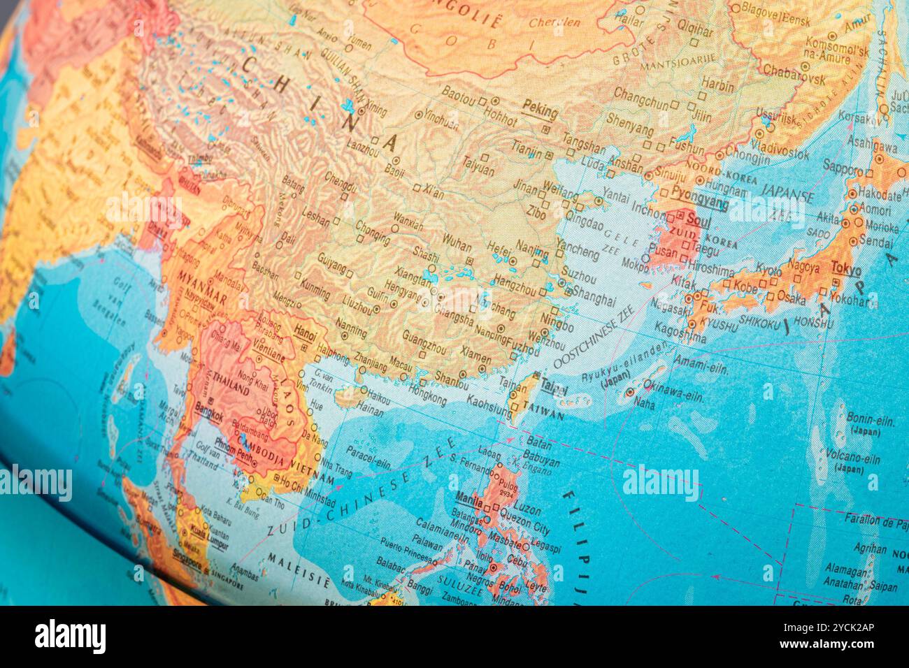Part of an illuminated globe showing southeast Asia and the equator ...