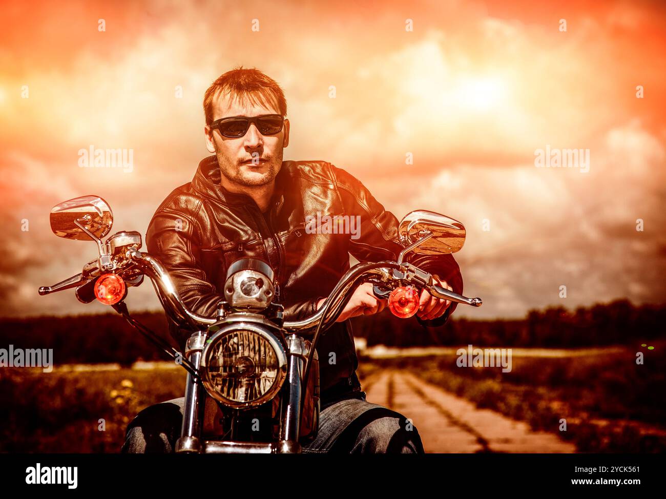 Biker on a motorcycle Stock Photo - Alamy