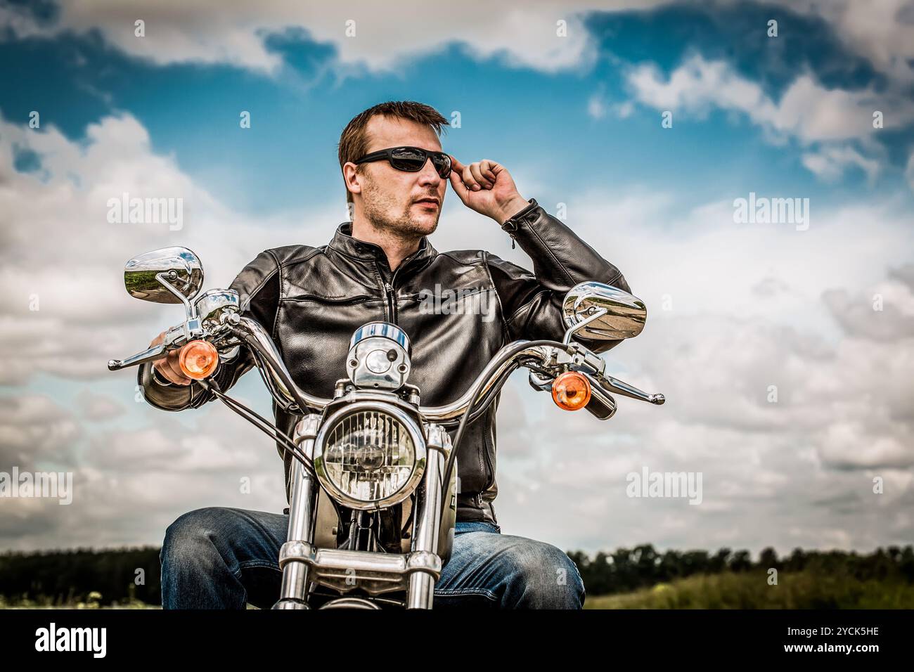 Biker on a motorcycle Stock Photo - Alamy