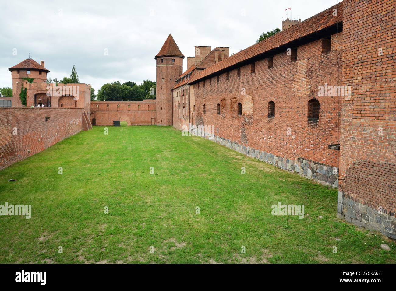 Walls of the gothic brick castle Malbork in Poland, medieval capital of ...
