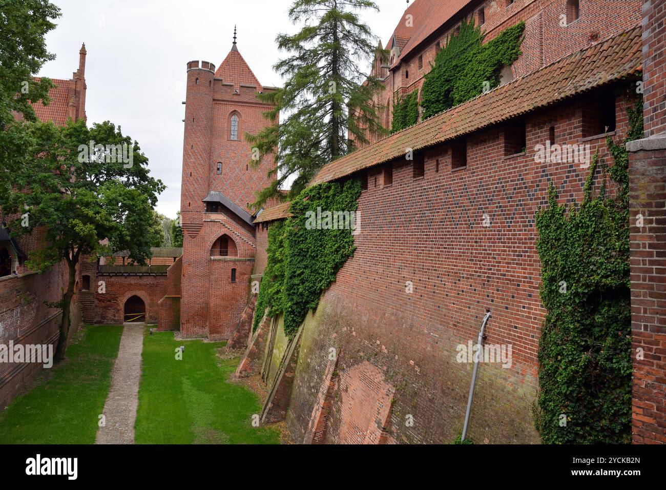 Walls of the gothic brick castle Malbork in Poland, medieval capital of ...