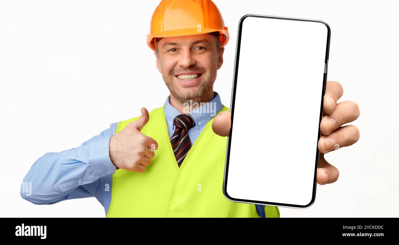 Construction Worker Showing Smartphone Empty Screen Gesturing Thumbs-Up ...