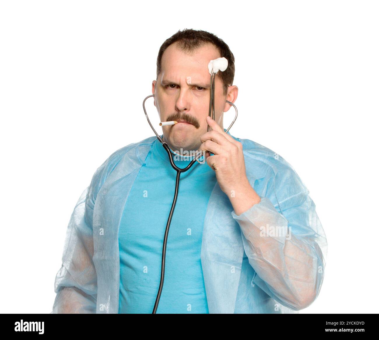 Smoking doctor with blue robe over white background Stock Photo - Alamy