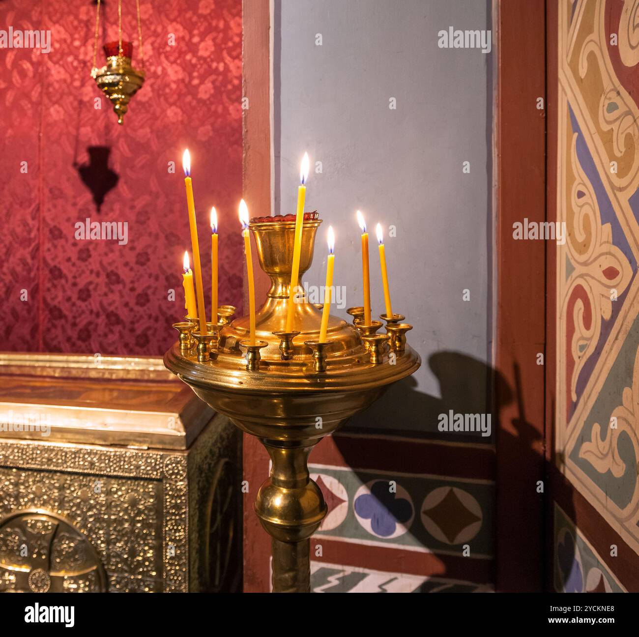 Burning candle in candlestick old hi-res stock photography and images ...