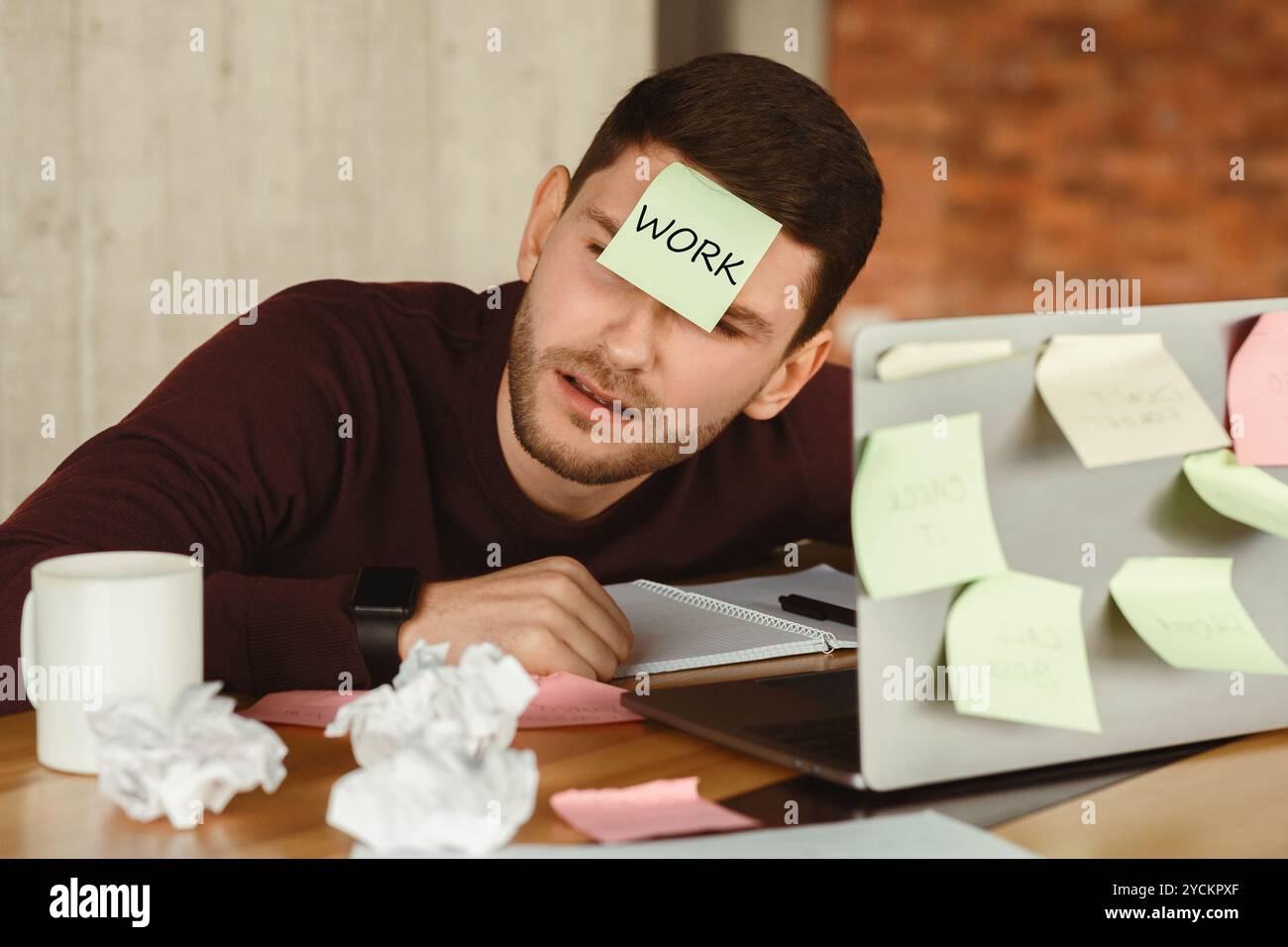 Overworked man sleeping tired of office multitasking work indoor Stock ...