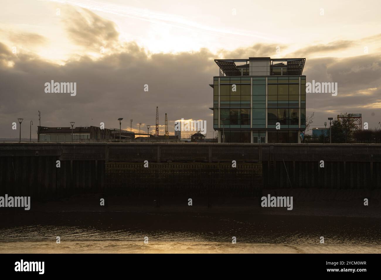Sunset over Humber Quays, Hull East Yorkshire. Centre right: office ...