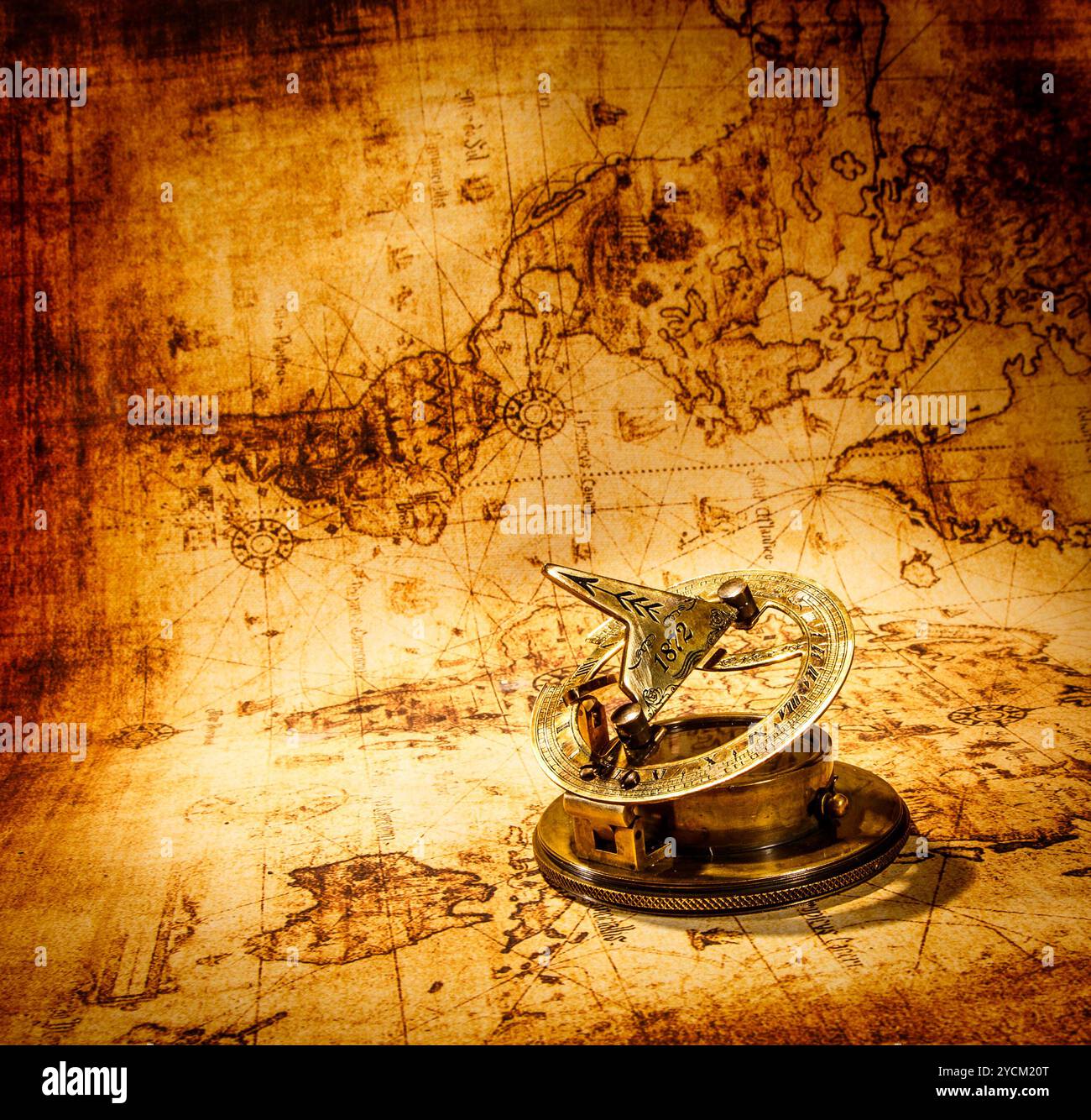 Vintage compass lies on an ancient world map Stock Photo - Alamy