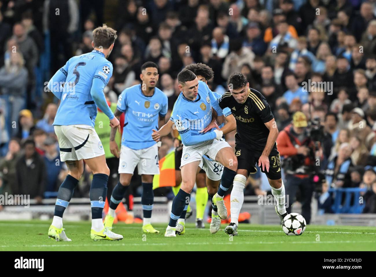 Manchester, UK. 23rd Oct, 2024. Phil Foden of Manchester City fouls ...