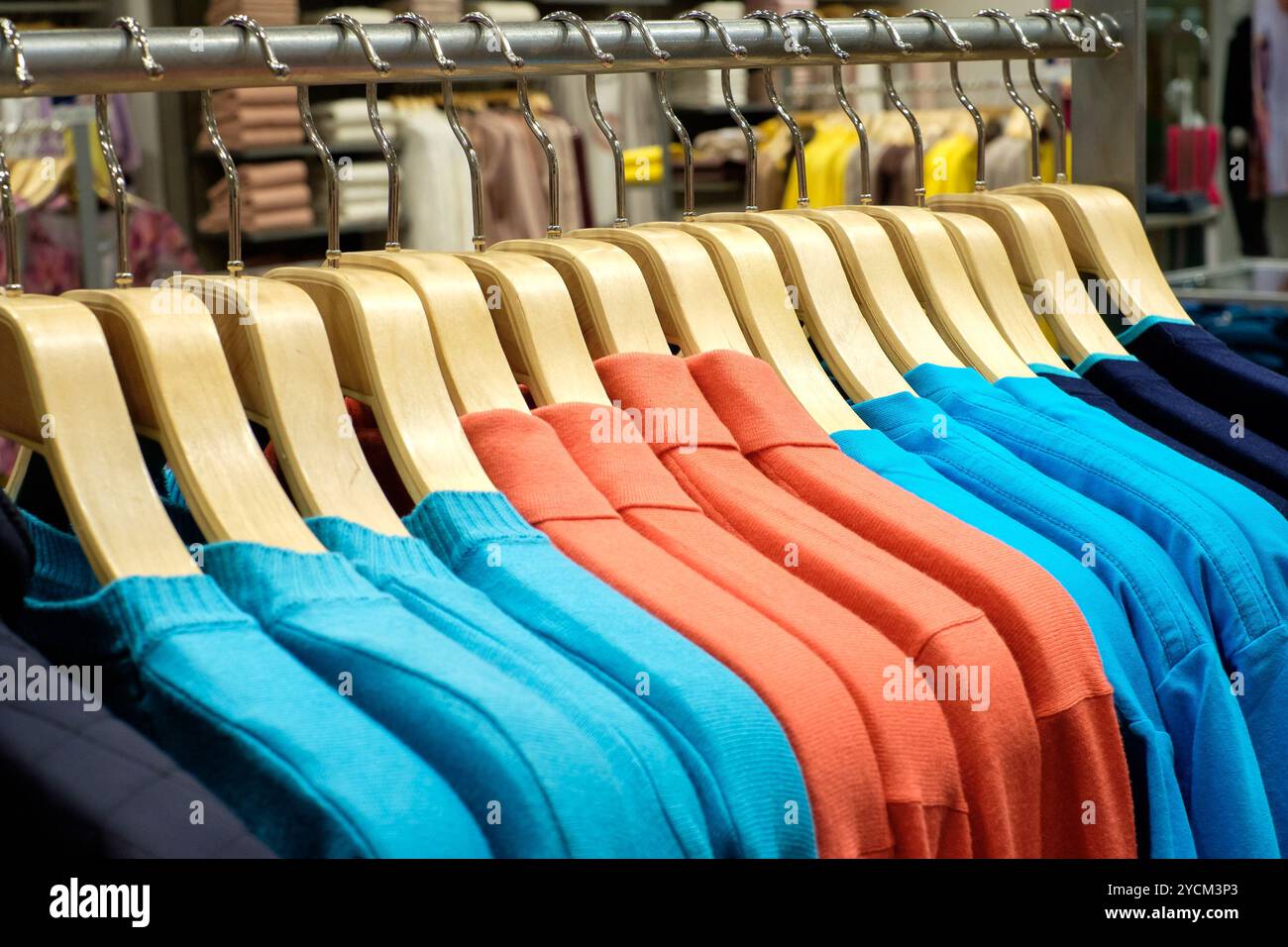 Different clothes on hangers in hi-res stock photography and images - Alamy