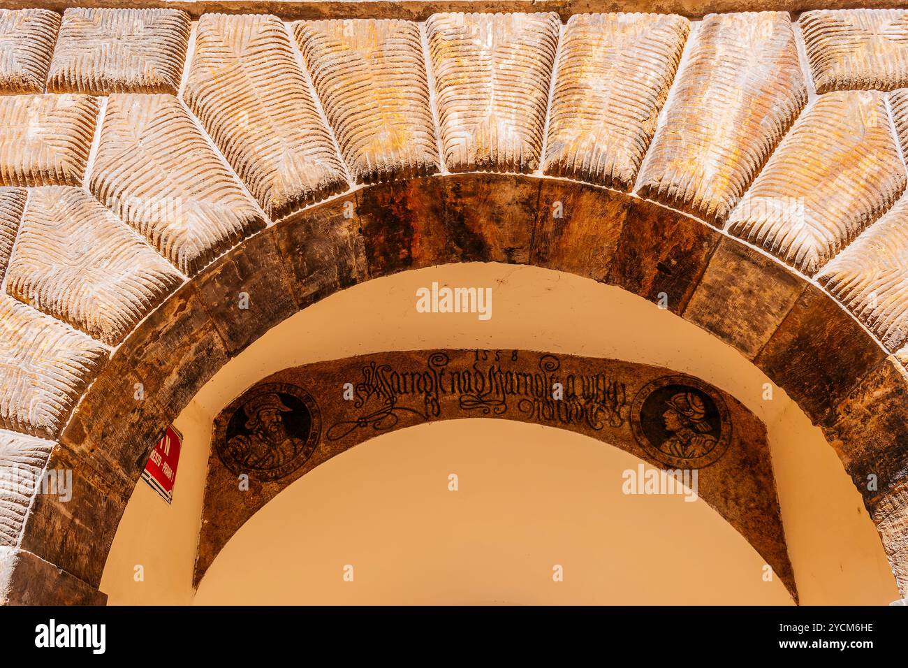 Entrance arches to the fortified area. Týn Yard. This small square next ...