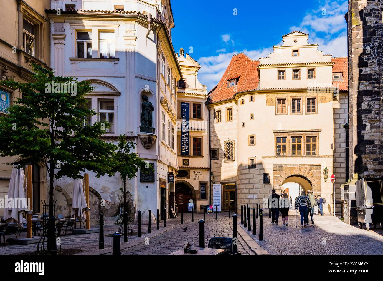 Entrance arches to the fortified area (R). Týn Yard. This small square ...
